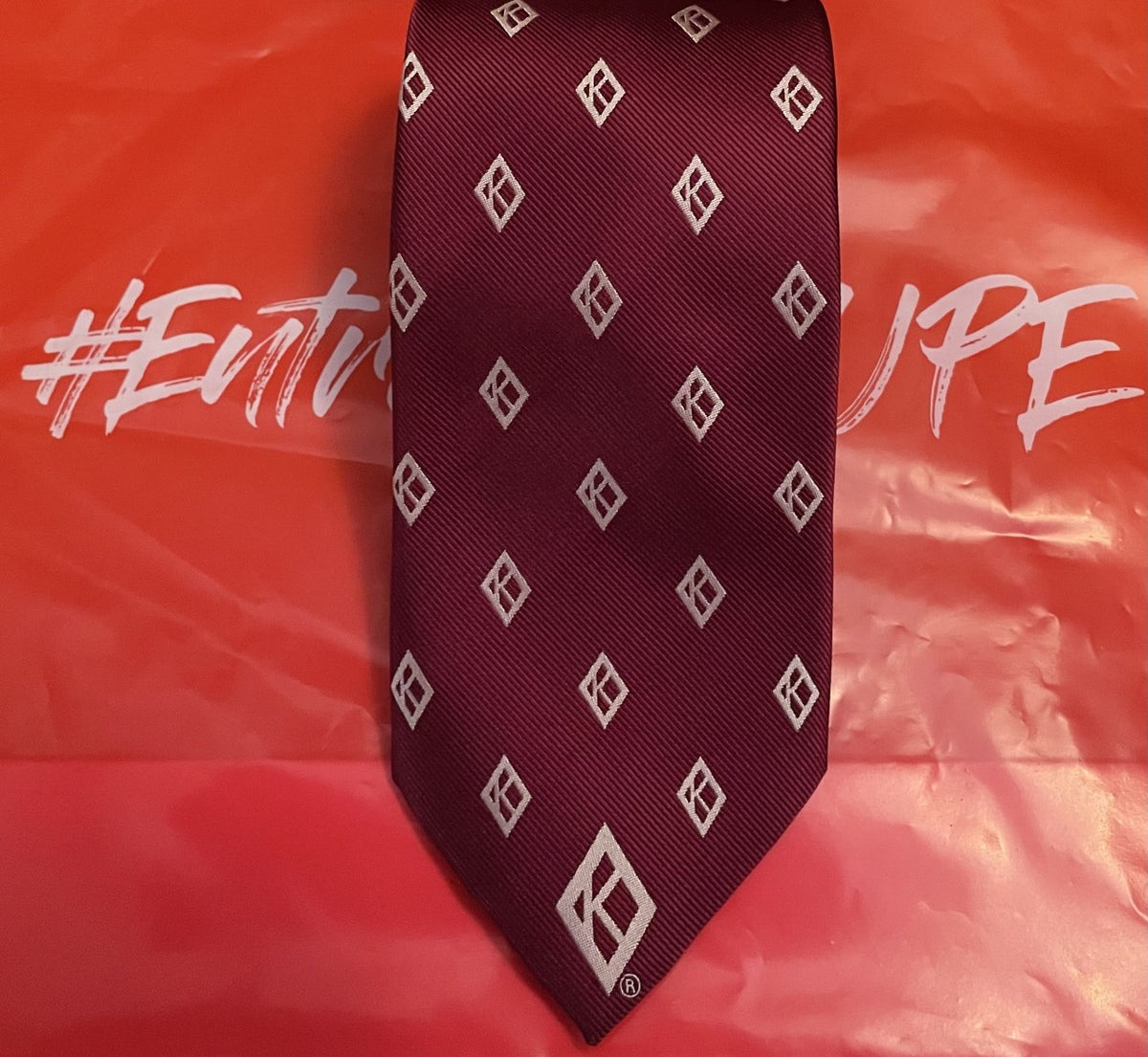 CRIMSON FLOATING K TIE – #EntrepreNUPE